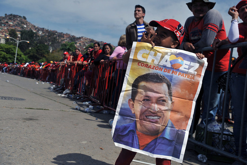 Countless venezuelans viewing the body of hugo chavez as it lies in ...